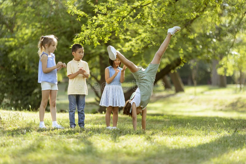 Group of Asian and Caucasian Kids Having Fun in the Park Stock Photo ...