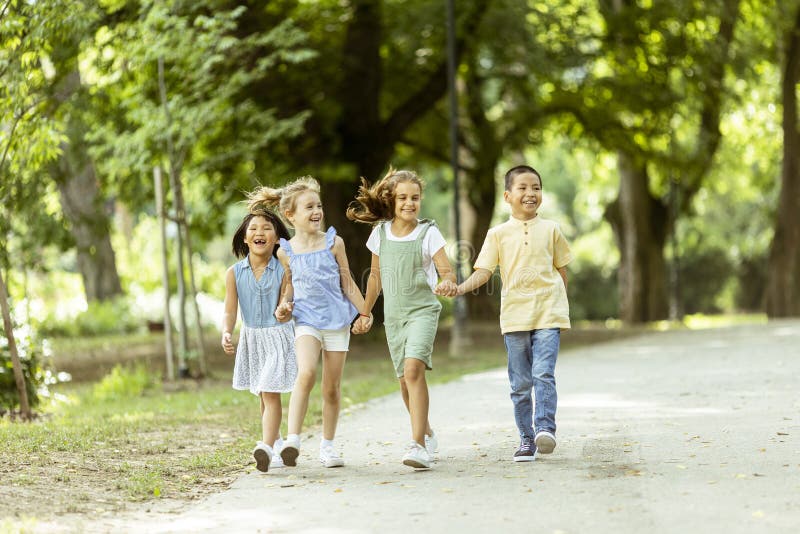 Group of Asian and Caucasian Kids Having Fun in the Park Stock Photo ...