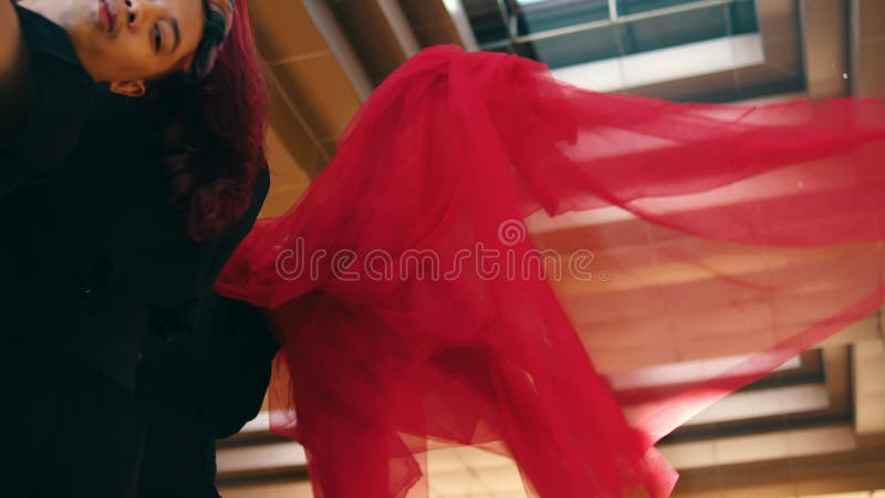 A Group of Asian Dancers Catch the Flying Red Cloth and Dance with it ...