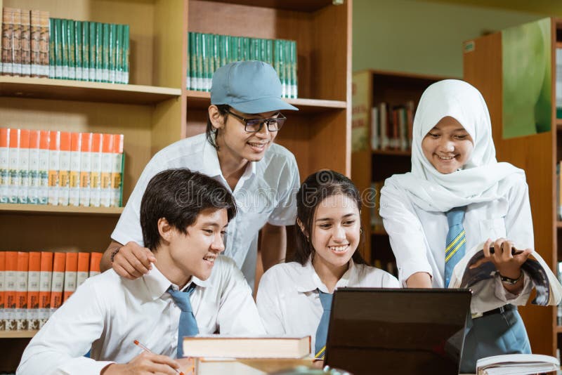 Group of Students Using Mobile Phone Stock Photo - Image of success ...