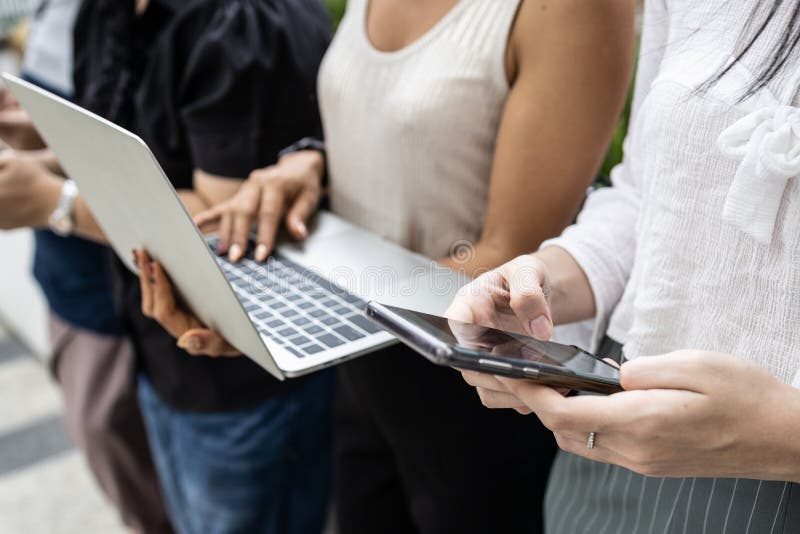 Group Asian People Using Devices Smartphone and Laptop Stock Photo ...