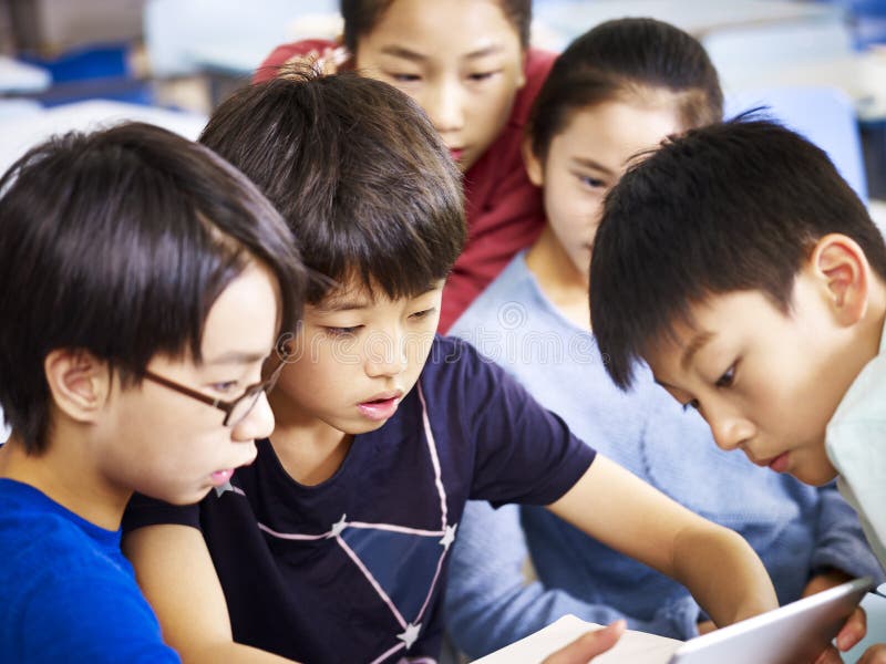 Group of Asian Pupil Using Tablet Together Stock Image - Image of kong ...