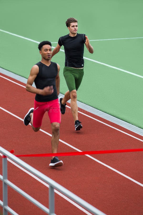 Group of Athlete Men Run on Running Track Outdoors Stock Image - Image ...