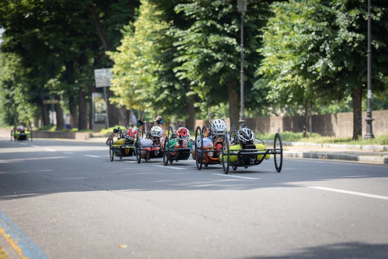 Group of Athletes with Their Special Bikes on a City Track in a Race ...