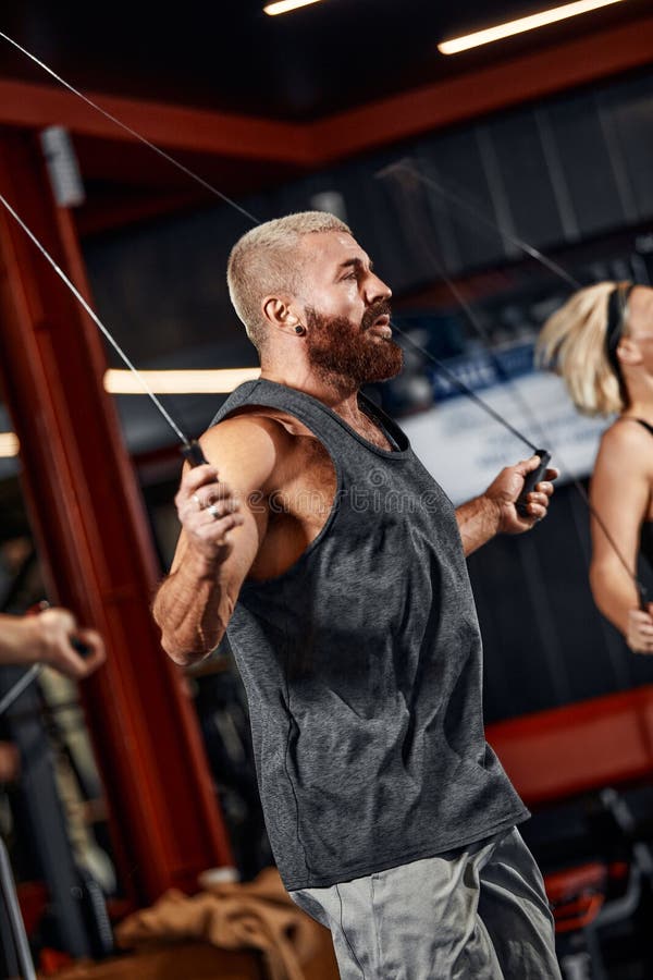 Group of Athletic People Using Jump Ropes for Their Workout in a Cross ...