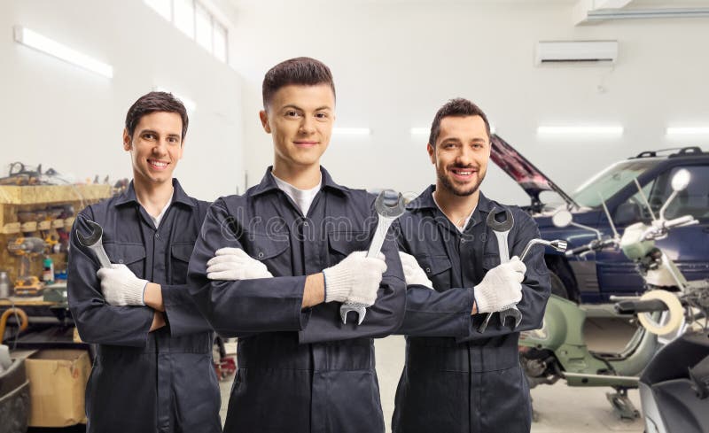Group of Auto Mechanic Workers in Uniforms with Tools Stock Image ...