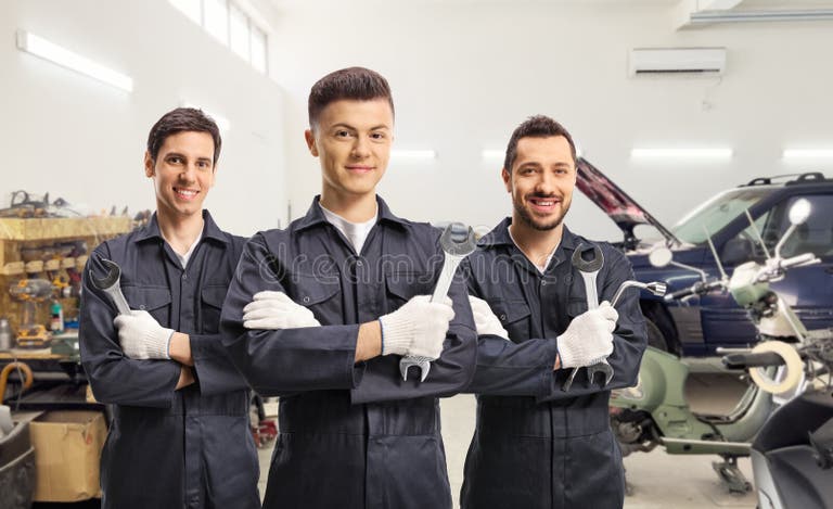 Group of Auto Mechanic Workers in Uniforms with Tools Stock Image ...