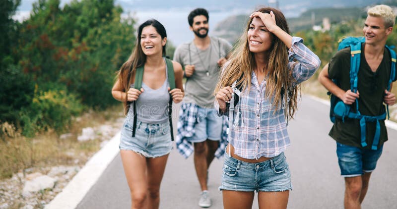 Group of Backpackers and Young Friends Traveling and Having Fun ...