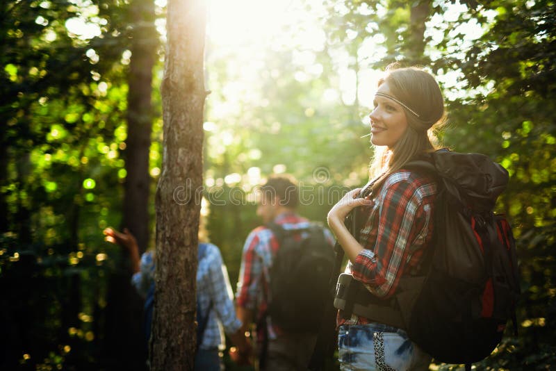 Group of Backpacking Hikers Going for Forest Trekking Stock Image ...