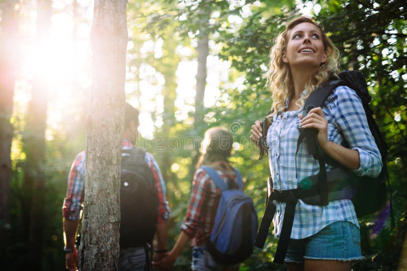 Group of Backpacking Hikers Going for Forest Trekking Stock Image ...