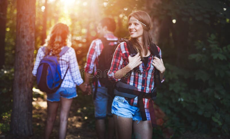 Group of Backpacking Hikers Going for Forest Trekking Stock Image ...