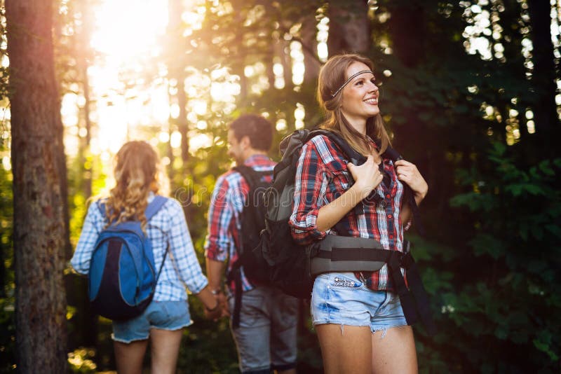 Group of Backpacking Hikers Going for Forest Trekking Stock Photo ...