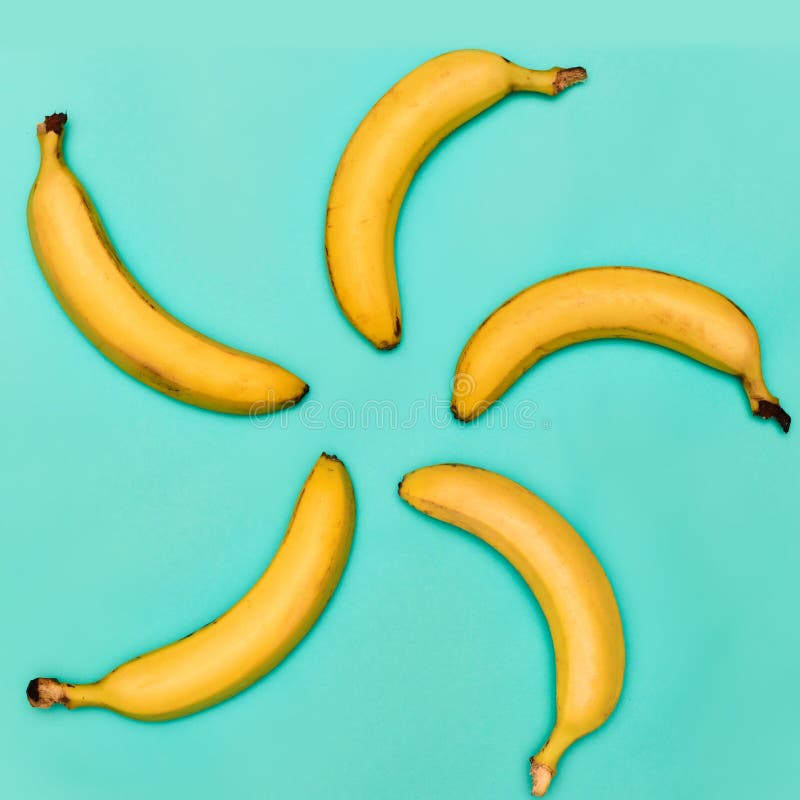 The Group of Bananas Against Blue Background Stock Photo - Image of ...