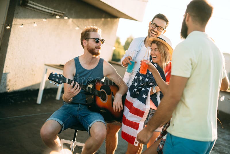 Group of Carefree Friends Dancing Have Fun in Summer Stock Photo ...