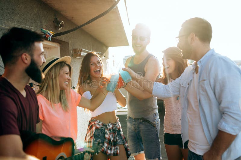 Group of Carefree Friends Dancing Have Fun in Summer Stock Photo ...