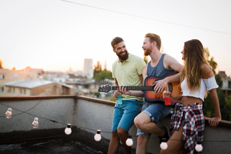 Group of Carefree Friends Dancing Have Fun in Summer Stock Photo ...