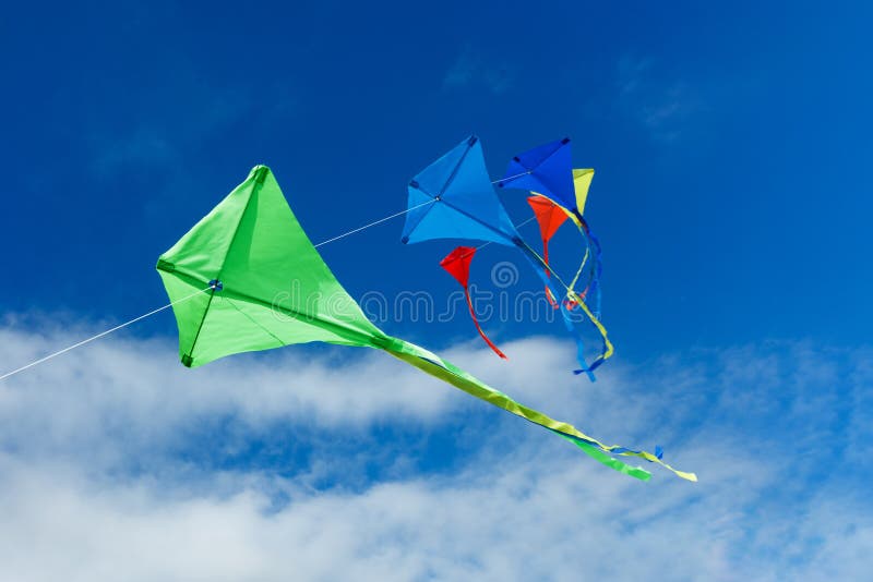 Group of Beautiful Colorful Kites Fly Over Blue Sky and Clouds Stock ...