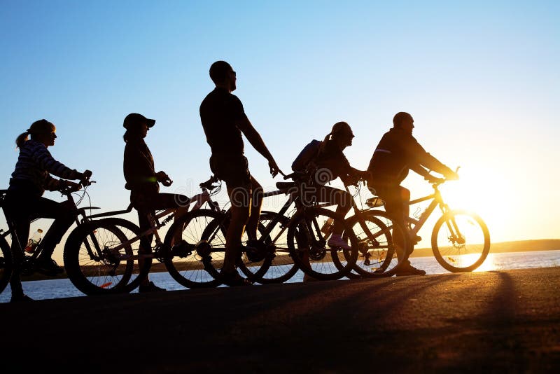 Friends on bicycles stock photo. Image of adult, happy - 23611548