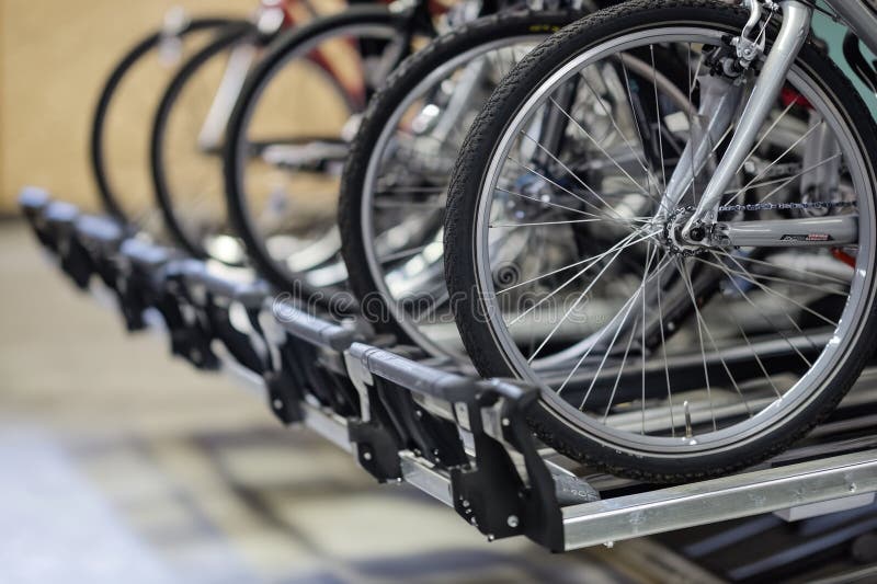A Group of Bicycles Parked Together on a Bike Rack Stock Photo - Image ...