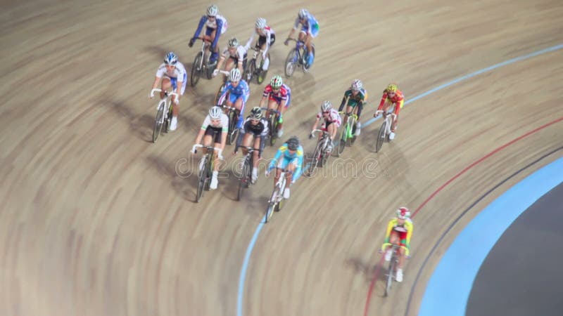 Group of Bicyclists Ride by Track, Shown in Stock Footage - Video of ...