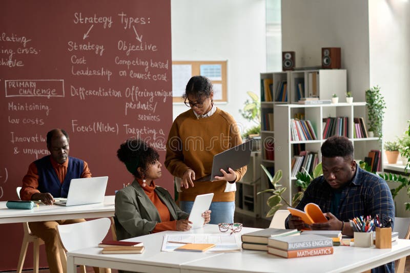 Group of Black College Students Working in Class Stock Image - Image of ...