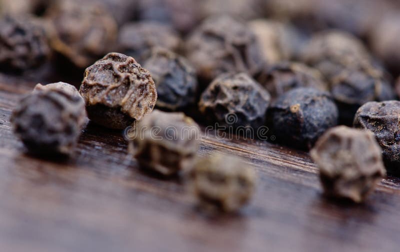Group of Black Pepper on Table Stock Image - Image of pepper, wooden ...