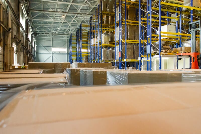 Group of Boxes in Storehouse. Pallets with Carton Boxes Stock Image ...