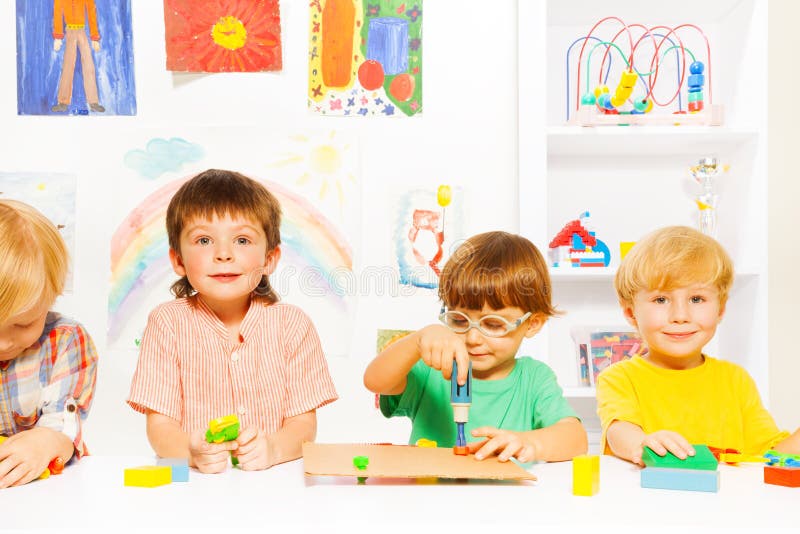Group of Boys in Classroom with Toy Work Tools Stock Photo - Image of ...