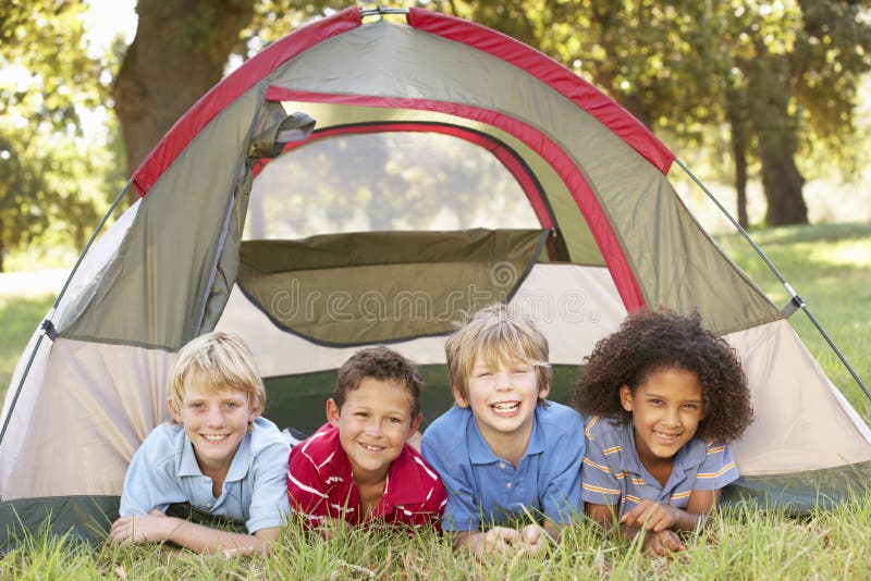 Group Of Boys Having Fun In Tent In Countryside Stock Image - Image of ...