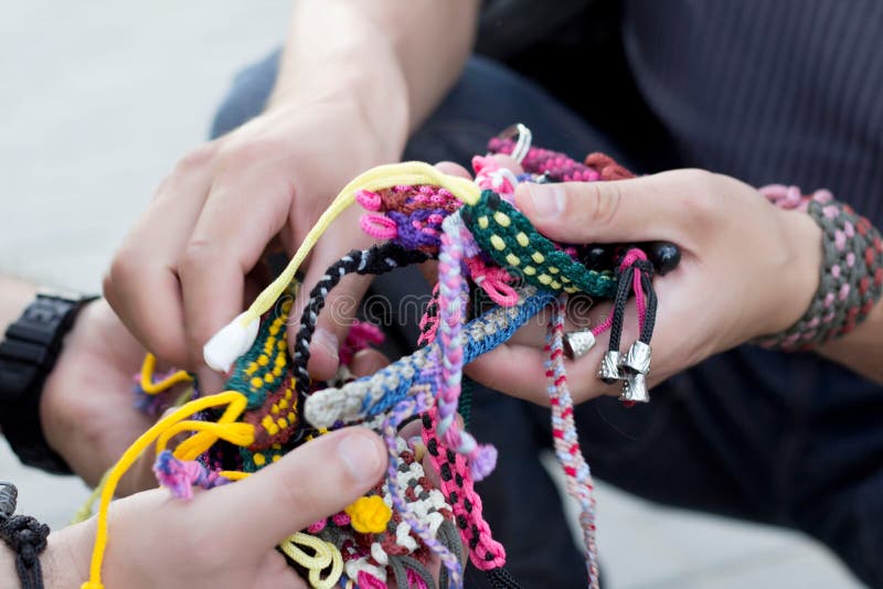 Group of Bracelets in Hands Stock Photo - Image of agreement, hand ...