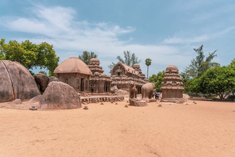 A Group of Buildings with a Large Rock in the Foreground. Mahabalipuram ...