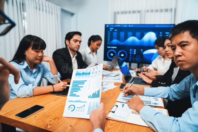 Group of Business Analyst Team Analyzing Financial Data Report ...