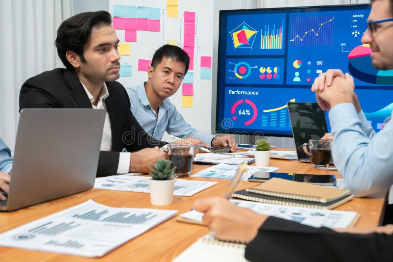 Group of Business Analyst Team Analyzing Financial Data Report ...