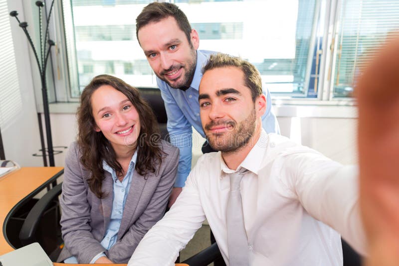 Group of Business Associates Working Together at the Office Stock Photo ... Group of Business Associates Working Together at the Office Stock Photo ...