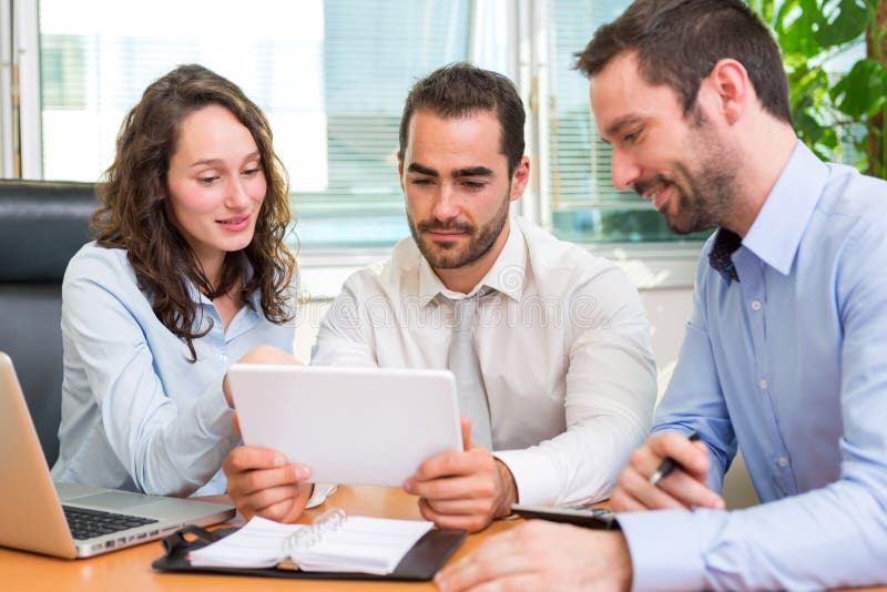 Group of Business Associates Working Together at the Office Stock Image ... Group of Business Associates Working Together at the Office Stock Image ...
