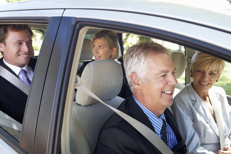 Group of Business Colleagues Car Pooling Journey into Work Stock Photo ...