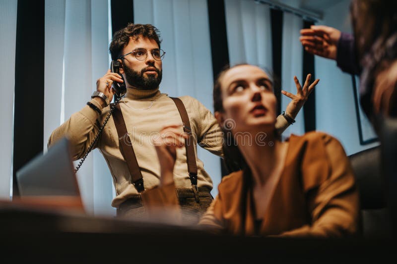 Office Workers Engaged in Conversation during a Business Discussion or ...