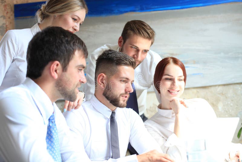 Group of Business Partners Discussing Ideas and Planning Work in Office ...