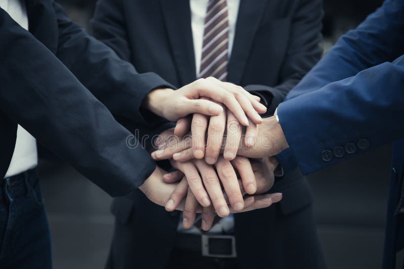Group of Business Partners Team with Hands Together. People with ...