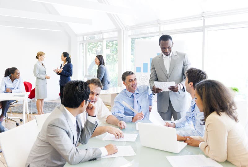 Group Of People Talking At Table Group Of Friends Sitting At Table In