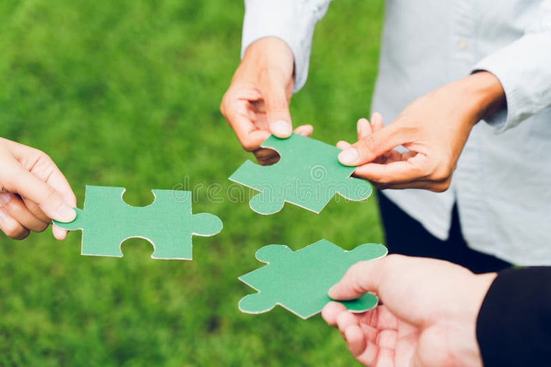 Group of Business People Assembling Jigsaw Puzzle. the Concept of ...