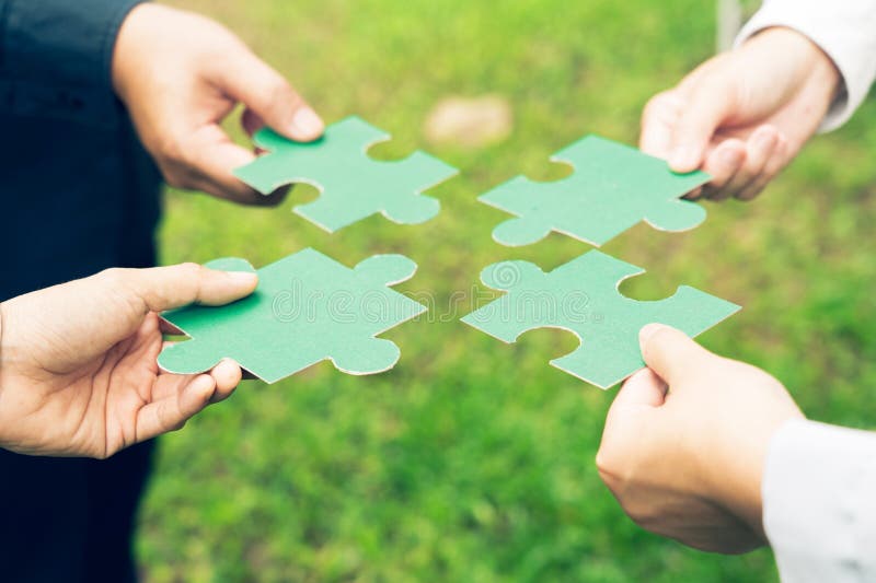 Group of Business People Assembling Jigsaw Puzzle. the Concept of ...