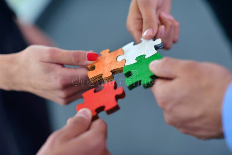 Group of Business People Assembling Jigsaw Puzzle Stock Image - Image ...