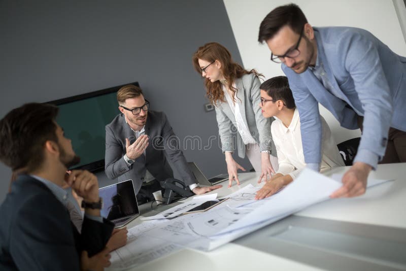 Group of Business People Collaborating in Business Office Stock Photo ...