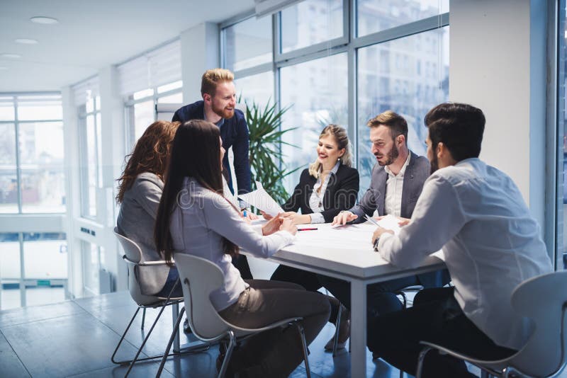 Group of Business People Collaborating in Office Stock Photo - Image of ...