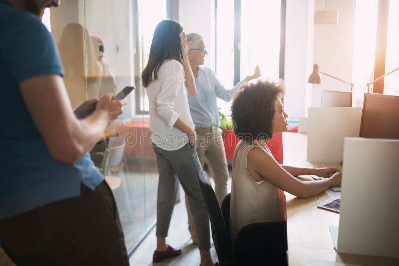 Group of Business People Collaborating on Project in Office Stock Photo ...