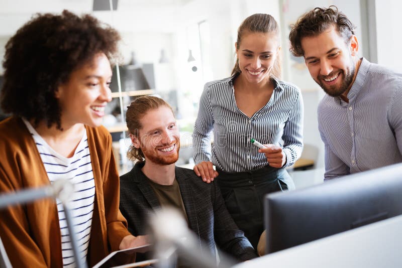Group of Business People Collaborating on Project in Office Stock Photo ...