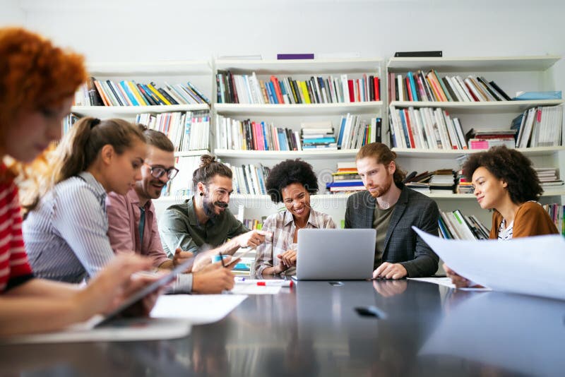 Group of Business People Collaborating on Project in Office Stock Photo ...