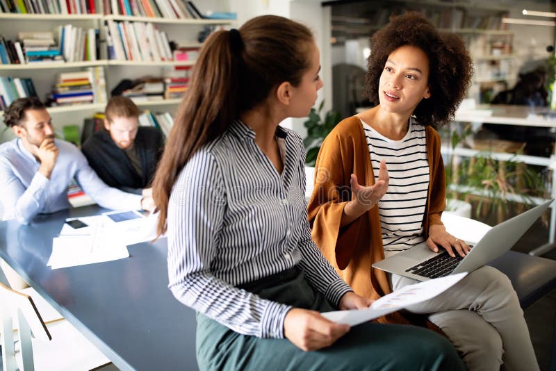 Group of Business People Collaborating on Project in Office Stock Photo ...