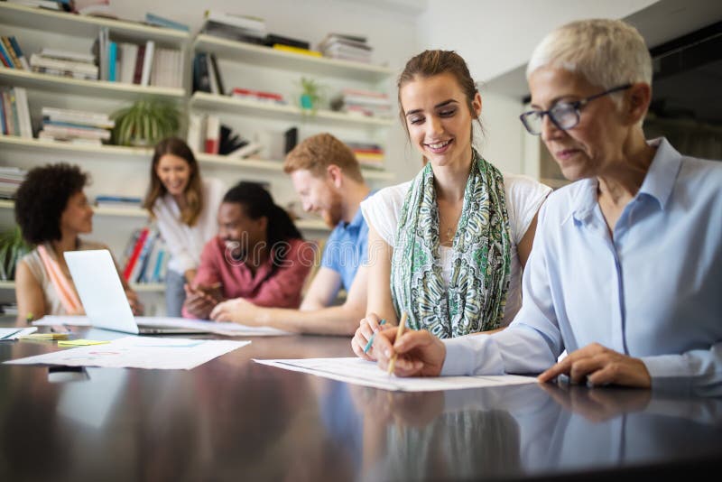 Group of Business People Collaborating on Project in Office Stock Image ...